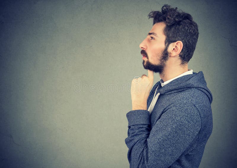 Man Standing with Hand on Chin Thinking about Question with Pensive ...