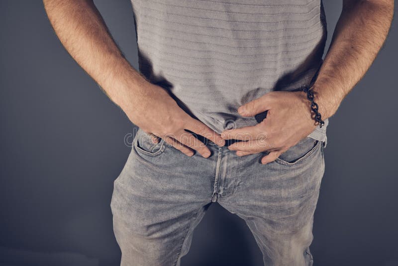 Man Standing with Hand in Trowser Stock Image - Image of medical ...