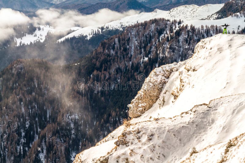 Man Standing on a High Cliff, Above the Clouds Stock Image - Image of ...