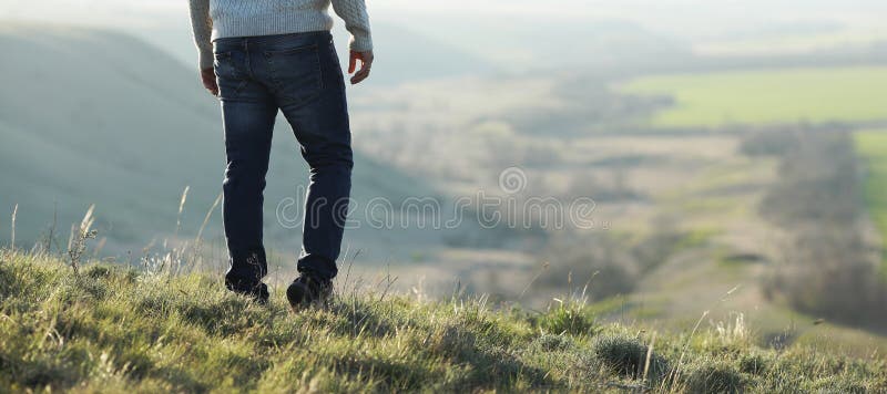 Man Standing on a Hill Looks into the Distance of the Plain Stock Photo ...