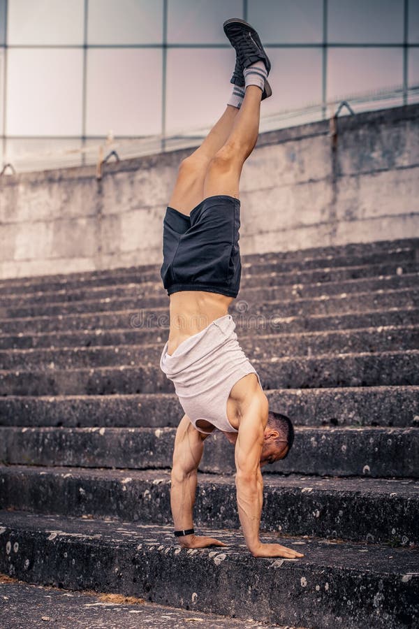 Man standing on his hands stock photo. Image of endurance - 108475030