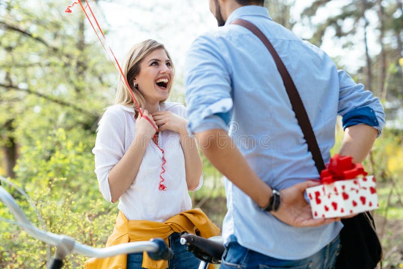 Man Standing and Holding White Surprise Gift Box Behind His Back Stock ...