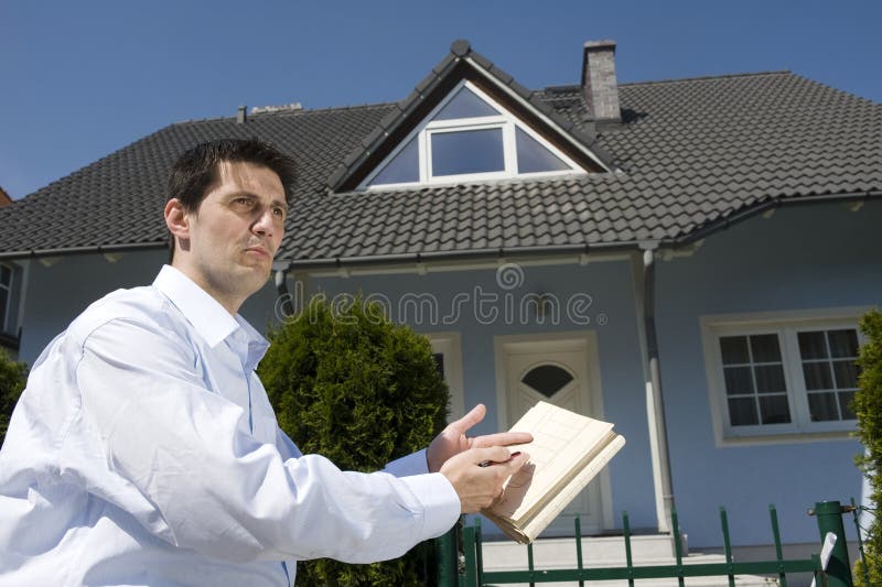 Man with house plans. stock image. Image of 070925m0117 - 3533025