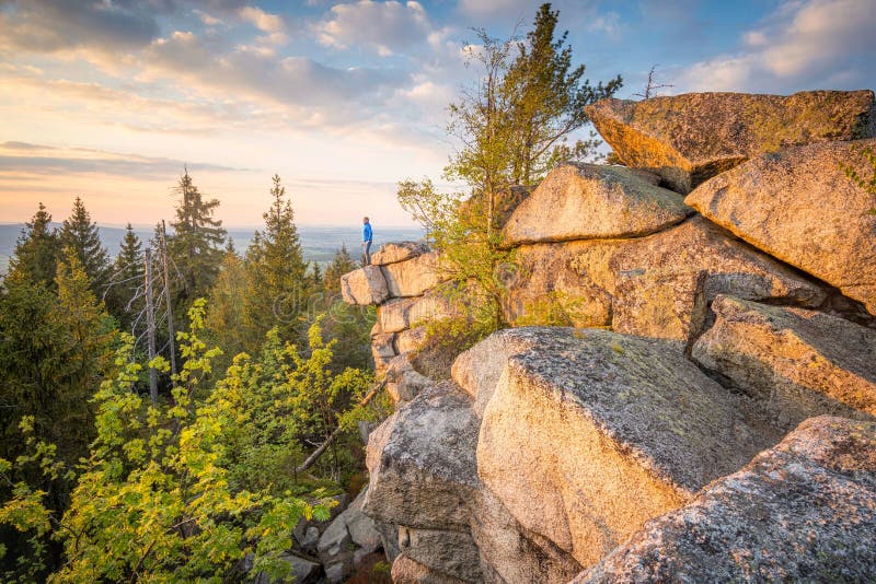 Man Standing on Huge Rock Formation Enjoying a Beautiful View Editorial ...