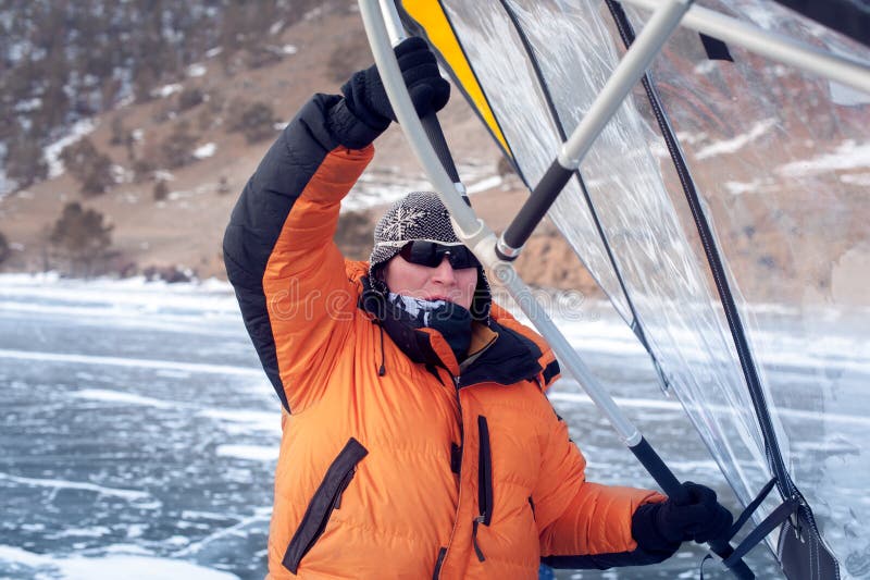 Man Standing on Ice with Wing in the Hands. Stock Photo - Image of wing ...