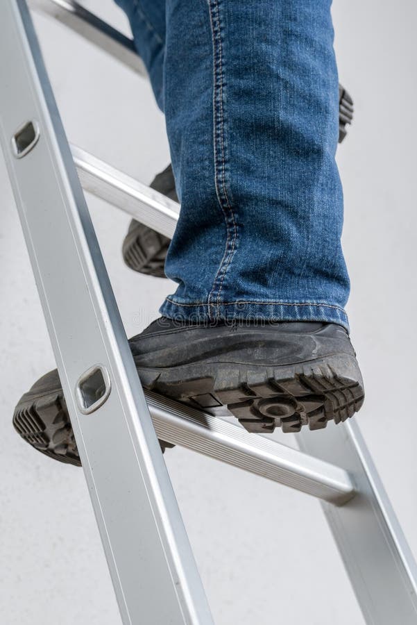 Man standing on a ladder stock image. Image of ladder - 89654165