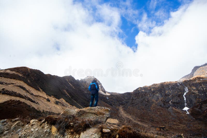 Man Standing Looking at Nature View Stock Photo - Image of backpack ...