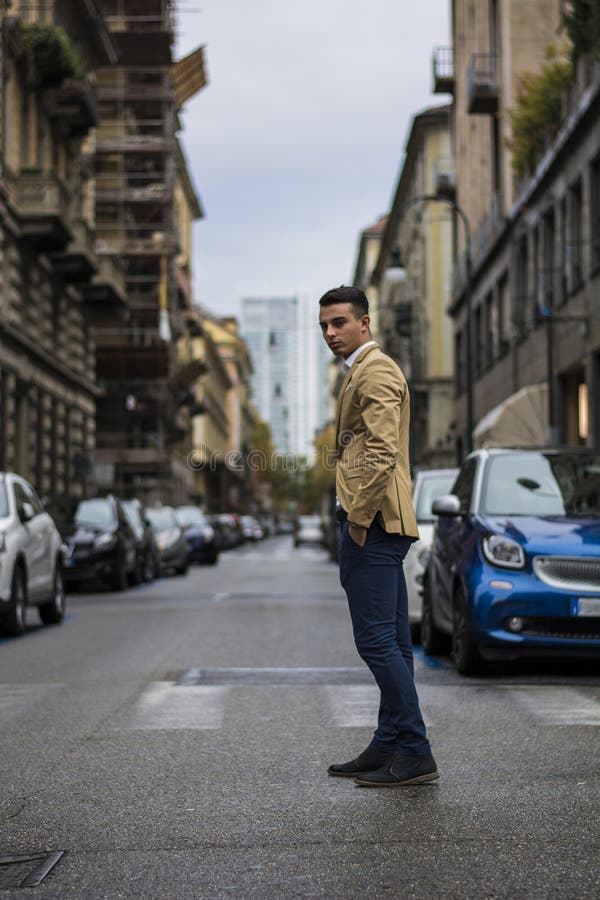 Photo of a Man Standing in the Middle of a Street Stock Image - Image ...