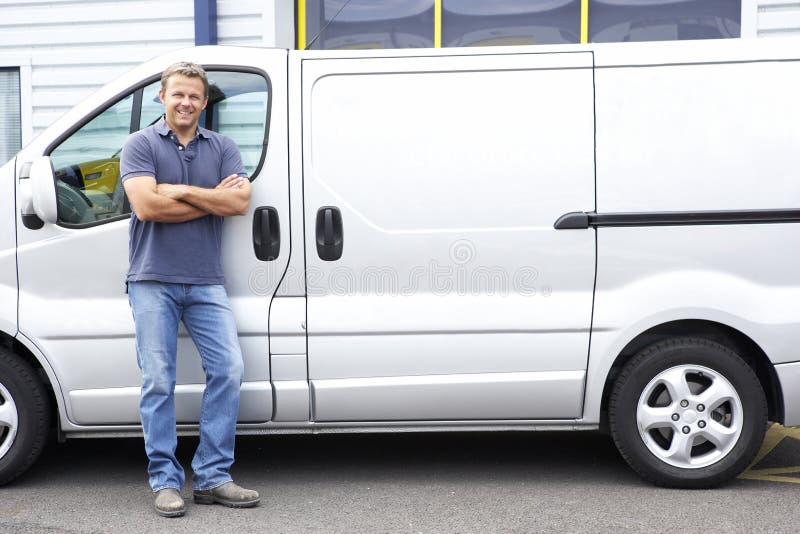 Man standing next to van stock photo. Image of business - 10971268