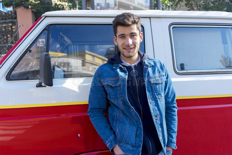 Happy Young Man Leaning at the Retro Mini Van Stock Photo - Image of ...