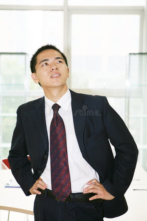 Man Standing in Office Building Stock Image - Image of executive ...