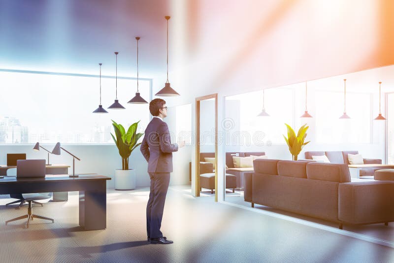 Man Standing in Office with Waiting Room Stock Image - Image of ...