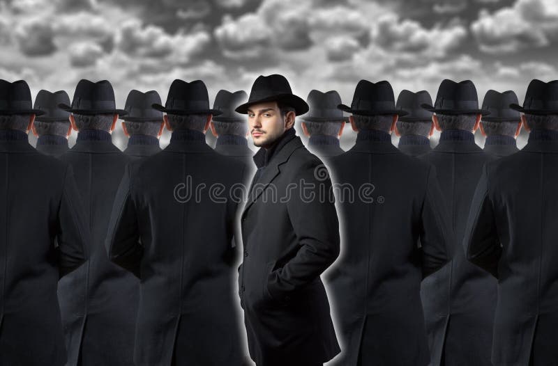 Man Standing Out from the Crowd Stock Photo - Image of original ...