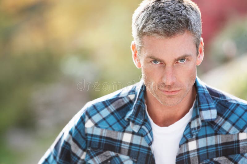 Man Standing Outside in Autumn Landscape Stock Image - Image of ...