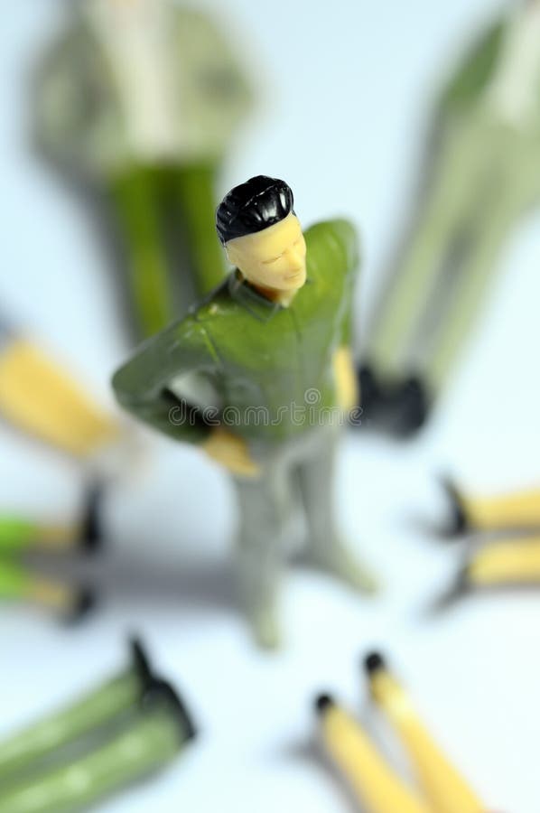 Man Standing Over Lying Figures Stock Image - Image of power ...