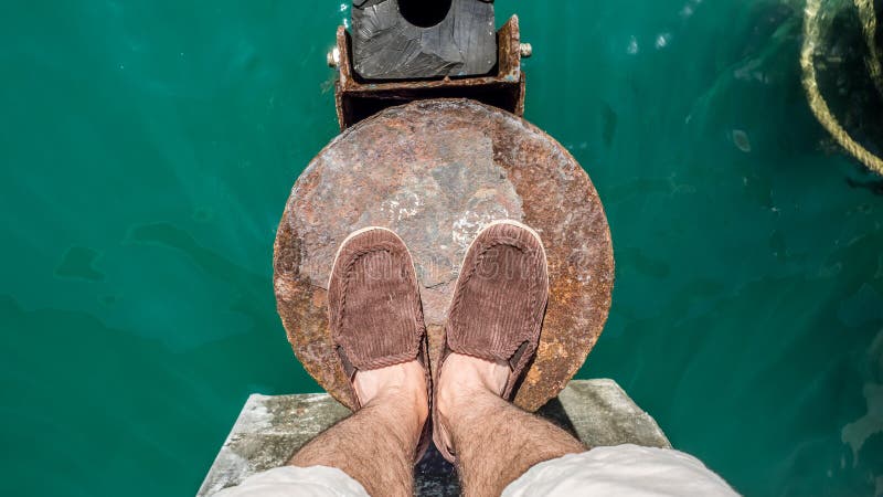 Man standing over the sea. stock photo. Image of adventure - 71109066
