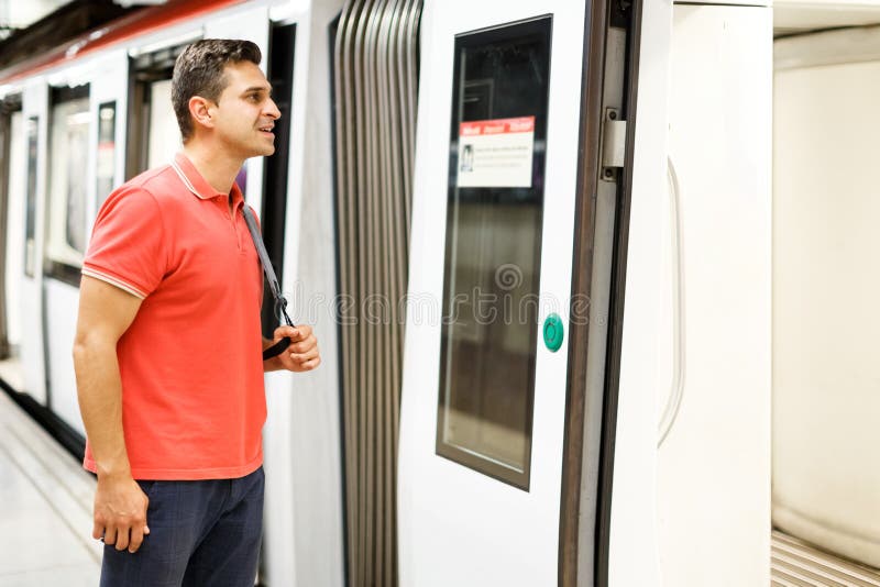 Man is Standing on Platform and Running into Train Stock Photo - Image ...