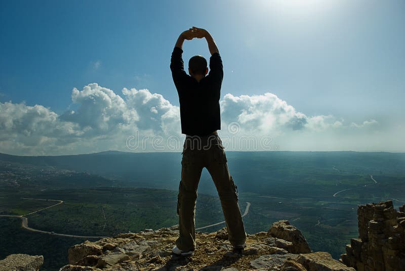 Man Standing at the Precipice Stock Photo - Image of graphics ... Man Standing at the Precipice Stock Photo - Image of graphics ...