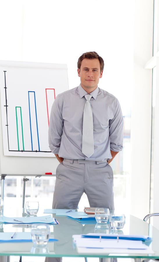 Man Standing in a Presentation Stock Image - Image of holding, board ...