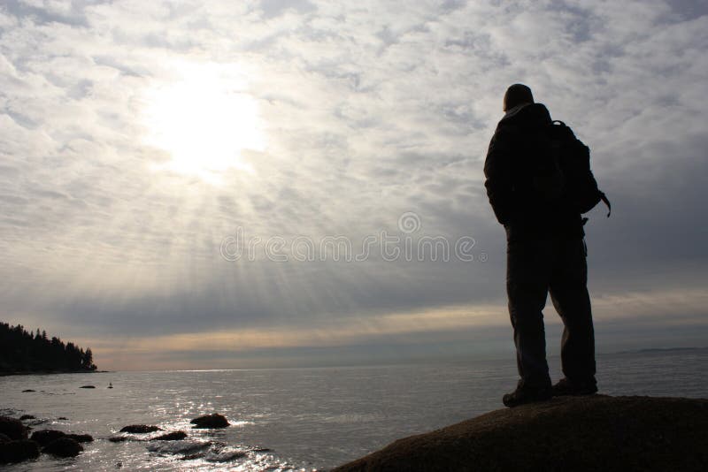 Man Standing on the Rock stock image. Image of depressed - 16212839