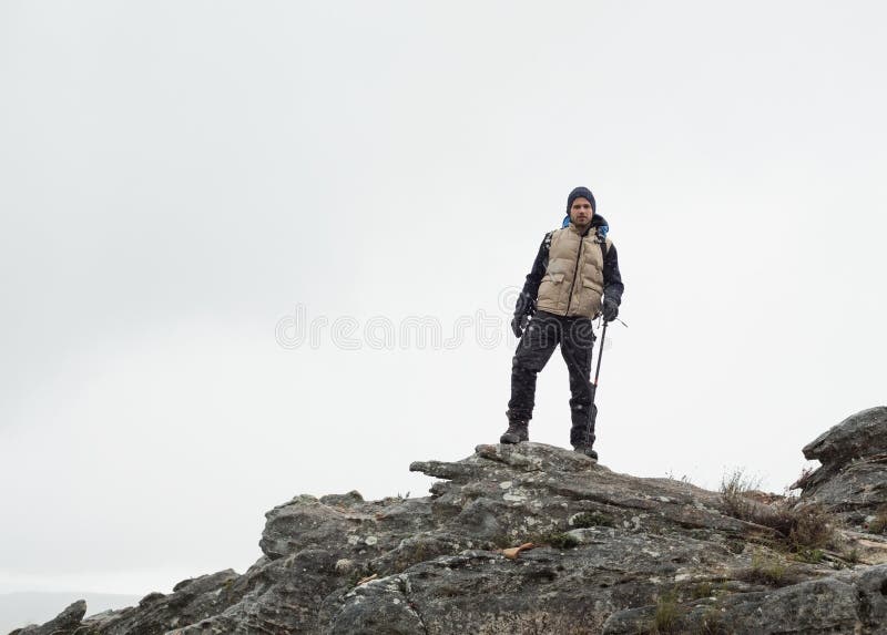 Man Standing on Rock Against the Clear Sky Stock Image - Image of ...