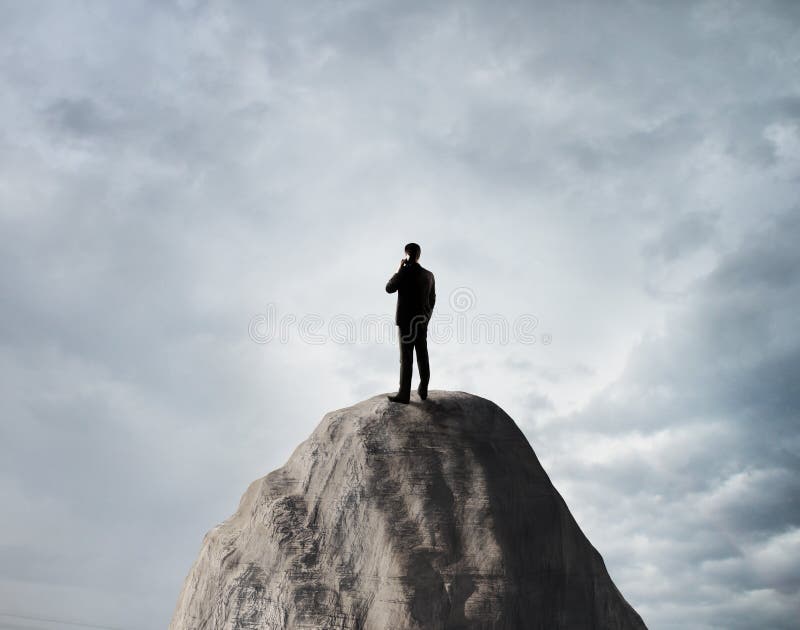 Man standing on rock stock photo. Image of outdoor, season - 33488184