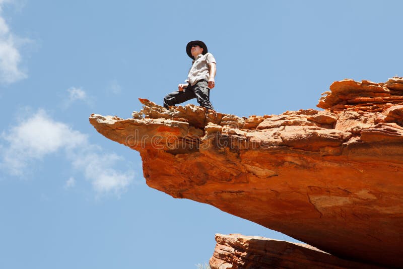 Man Standing on the Rock Edge Stock Photo - Image of high, exploring ...