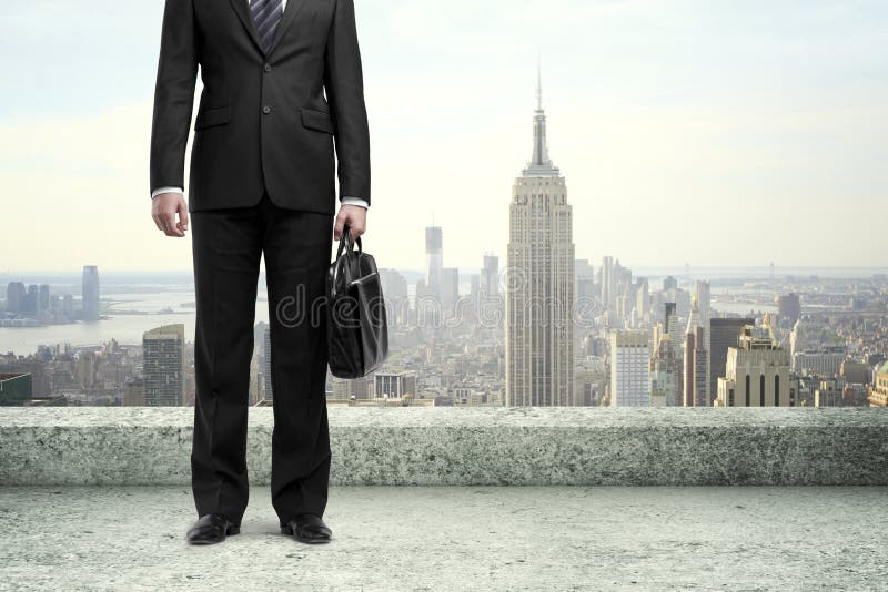 Man standing on roof stock photo. Image of boss, building - 33488258