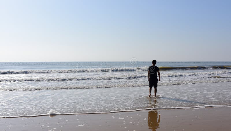 Man Standing in Sea with Waves Stock Photo - Image of nature, standing ...