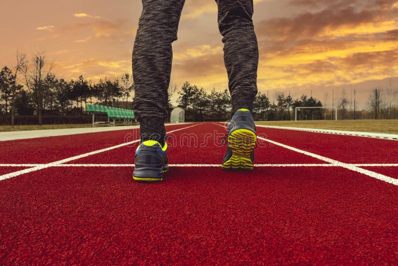 Man Standing on the Start Line in the Sports Ground Stock Photo - Image ...