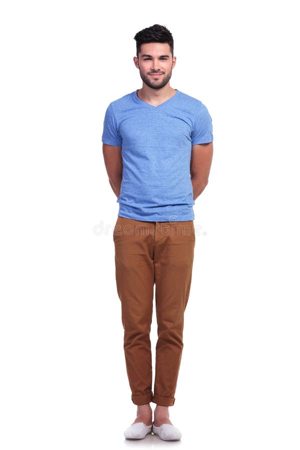 Man Standing Straight With Hands At His Back Stock Photo - Image of ...