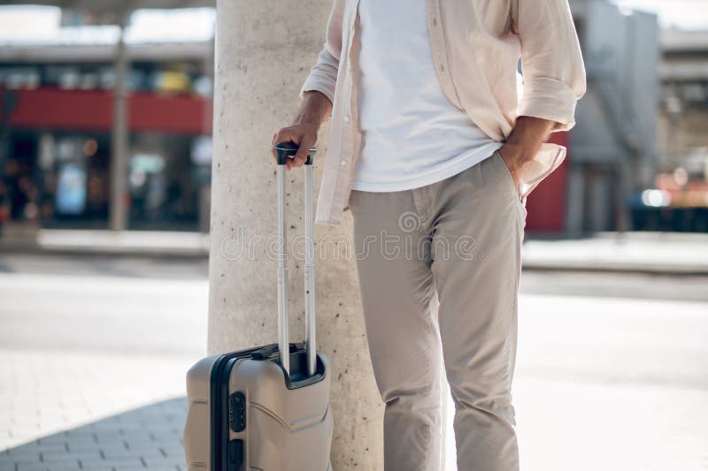 Man Standing with Suitcase in the City Street. Stock Photo - Image of ...