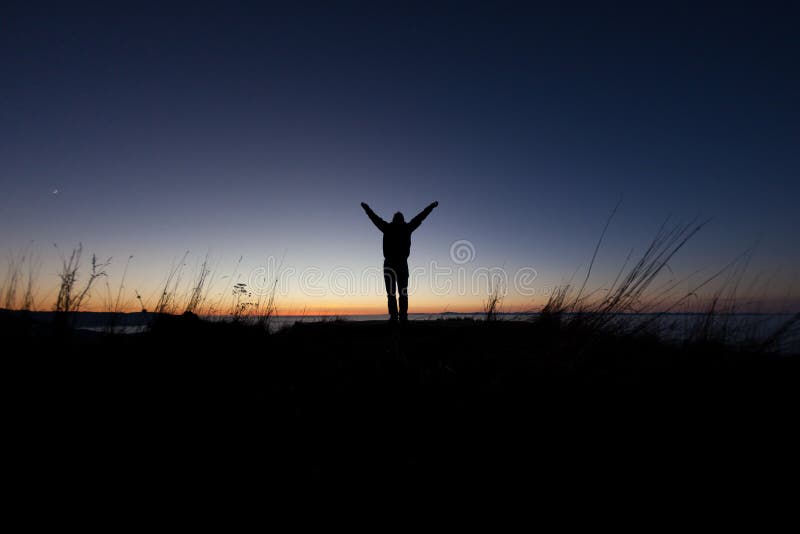 Man Standing in Sunset on Mountain Stock Photo - Image of dawn ...