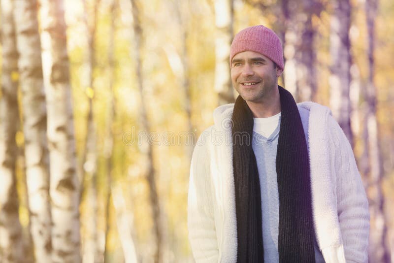 Man Standing between Trees in Fall Stock Image - Image of scarf, leaf ...