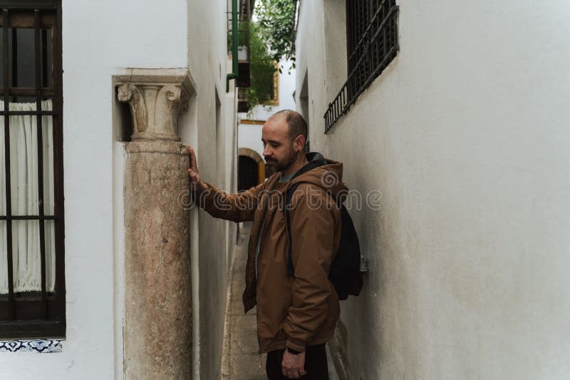 Man on Narrow Path between Buildings Stock Photo - Image of life ...