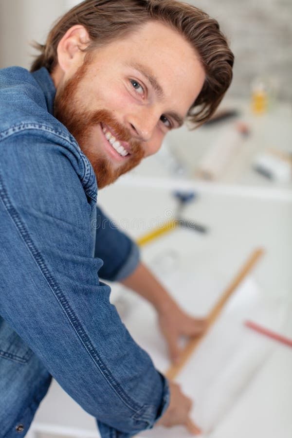 Man Stands Over Desk Using Ruler Stock Photo - Image of office ...