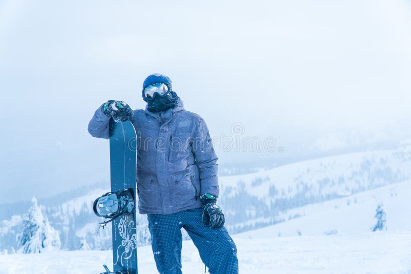 A Man Stands with Snowboarding. Stand Mount Stock Photo - Image of ...