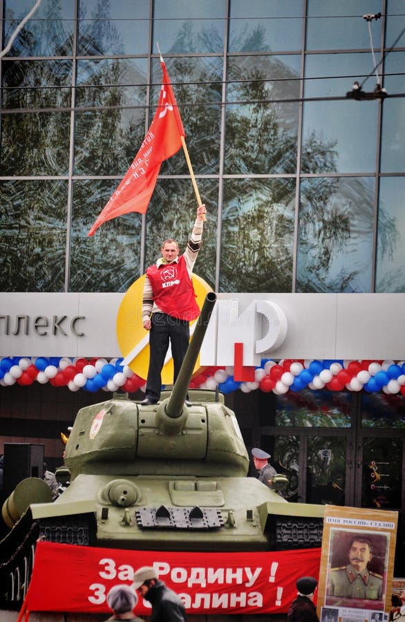 A Man Stands on a Tank and Waving the Soviet Flag Editorial Stock Image ...