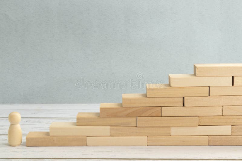 A Man Stands at the Very Bottom of a Wooden Staircase Stock Image ...