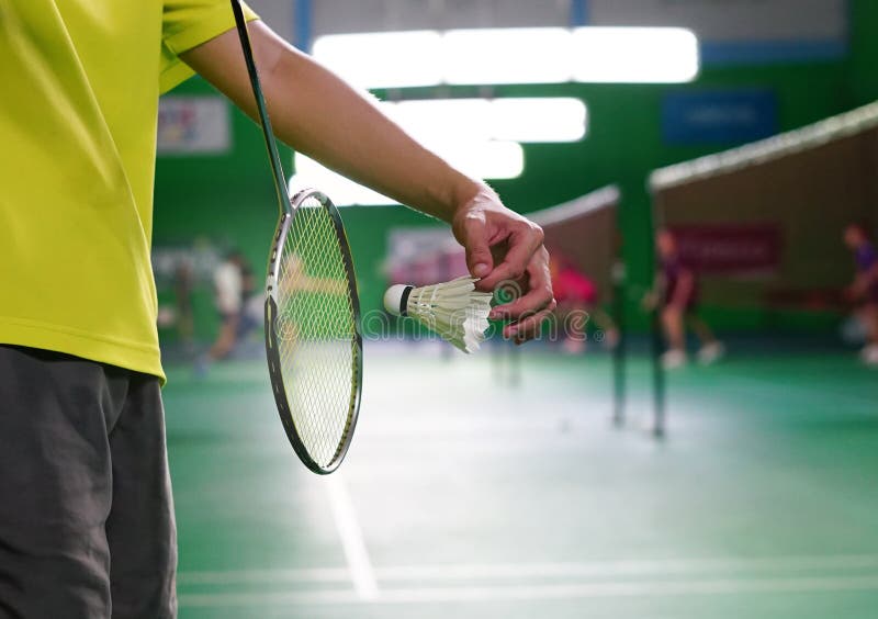 Man Start the Game by Serving a Shuttlecock,badminton Playing Concept ...
