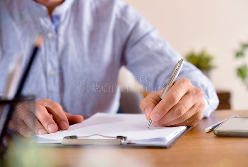Man Starting To Write on Empty Sheet Front View Stock Image - Image of ...