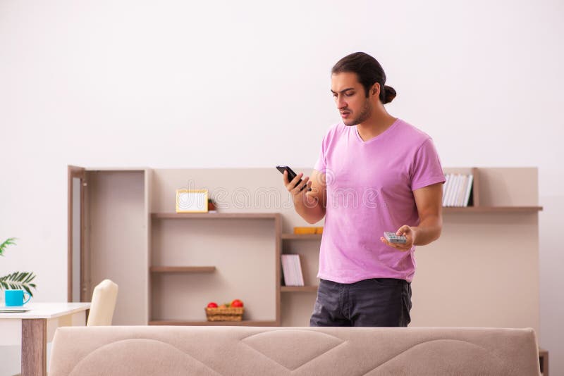 Young Man Staying at Home during Pandemic Stock Photo - Image of crisis ...
