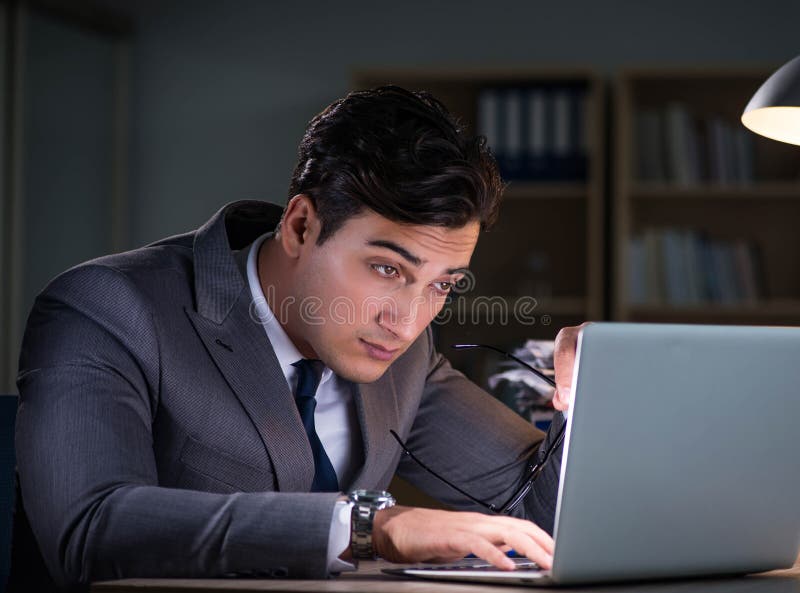 Man Staying in the Office for Long Hours Stock Image - Image of ...