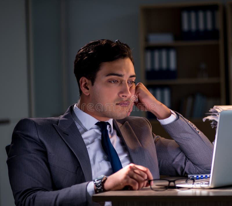 Man Staying in the Office for Long Hours Stock Photo - Image of ...