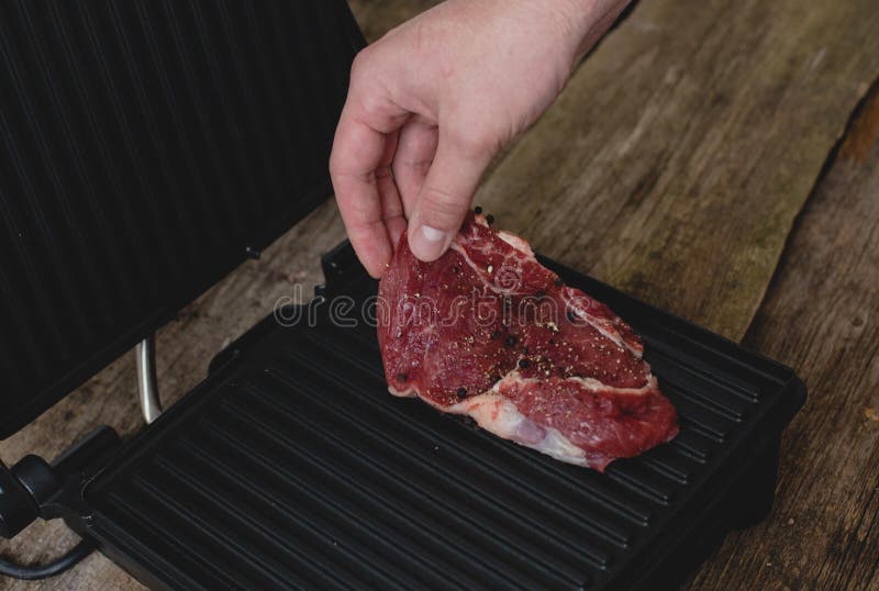 Man with steak stock photo. Image of beef, dinner, rural - 46684228