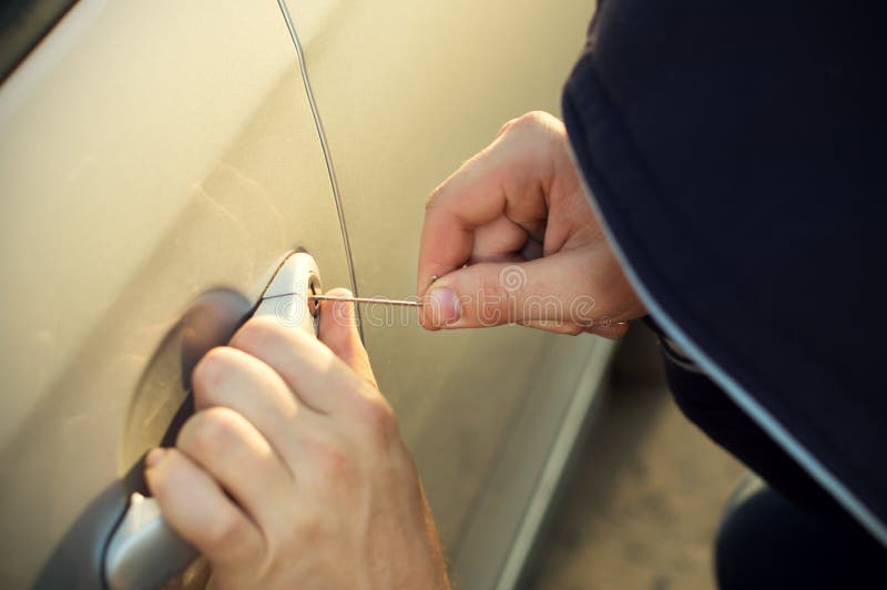 A Man Steals Someone Else`s Car, Pick a Lock Stock Image - Image of ...