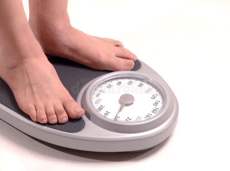 Man stepping on a scale stock image. Image of step, foot - 4400385