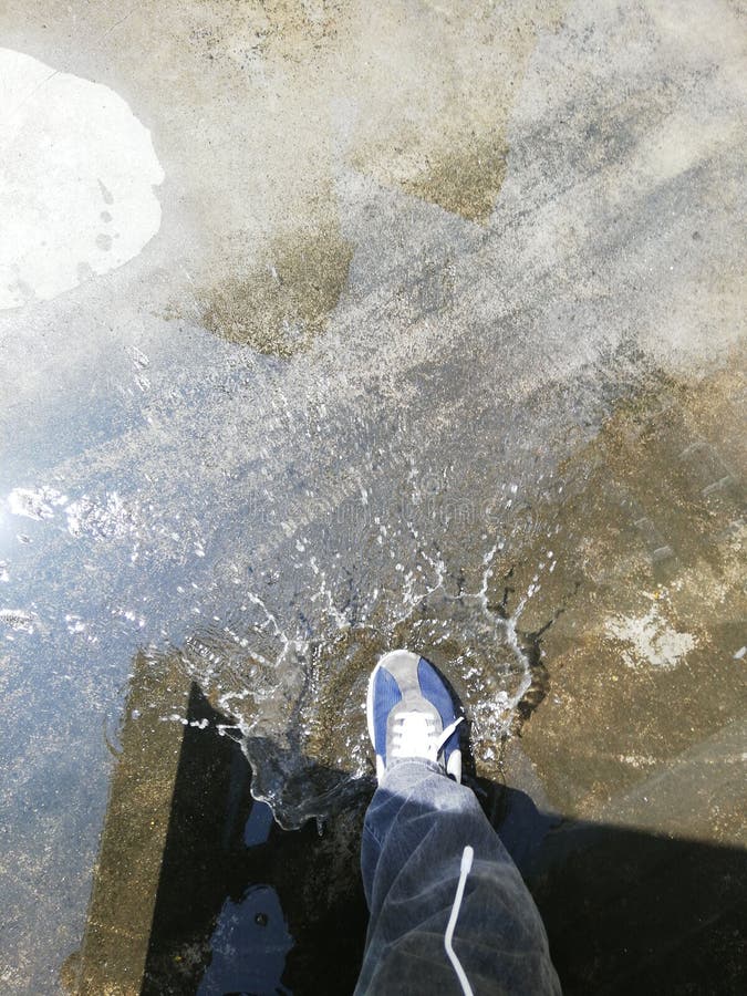 Man Stepping into a Water Pool Stock Photo - Image of reflection, cross ...