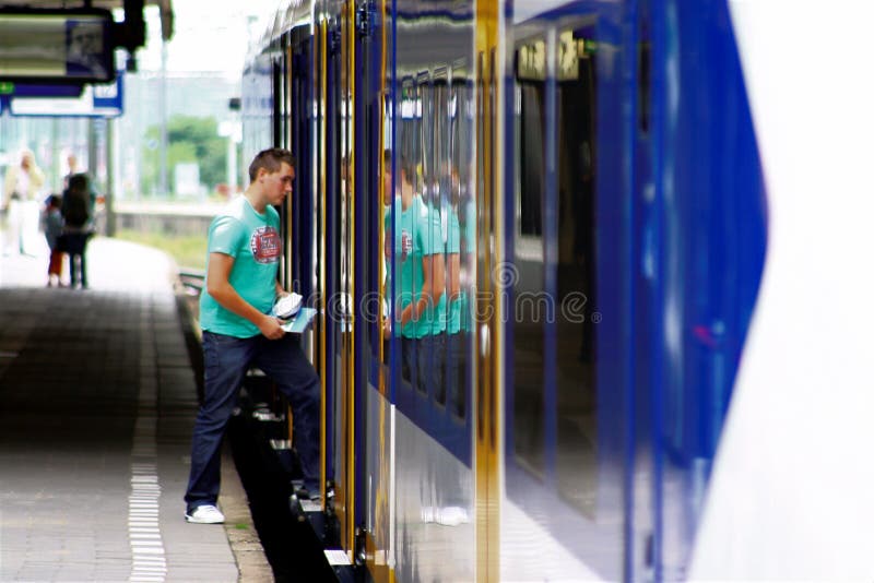 Man Steps in at Railwaystation Utrecht, Holland, the Netherlands ...