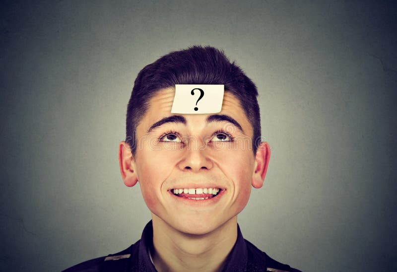 Man with Sticky Note Question Mark on Forehead Looking Up Stock Photo ...